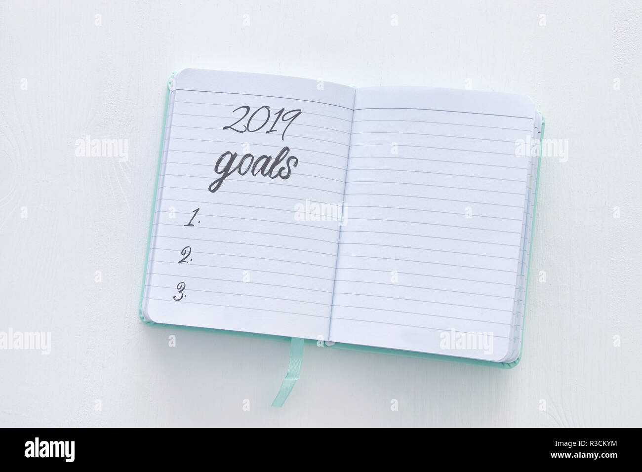 Top view 2019 goals list with notebook over white wooden desk Stock ...