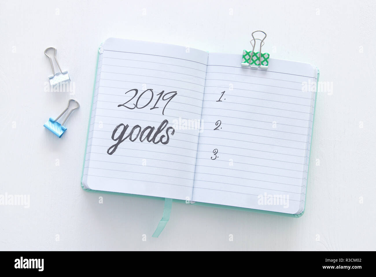 Top view 2019 goals list with notebook over white wooden desk Stock ...