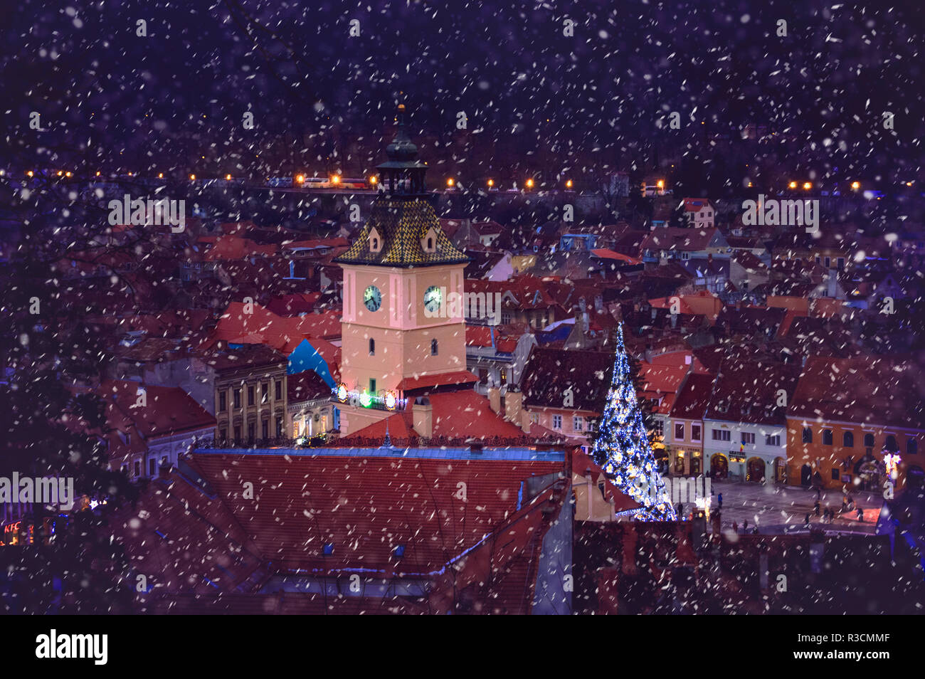 The City hall building and Christmas tree in the center of Brasov, seen ...