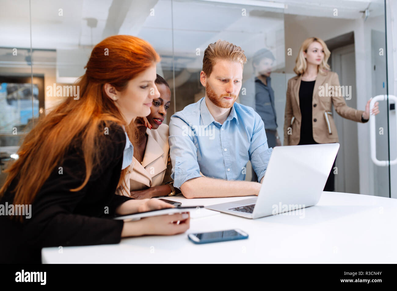 Creative business people brainstorming Stock Photo - Alamy