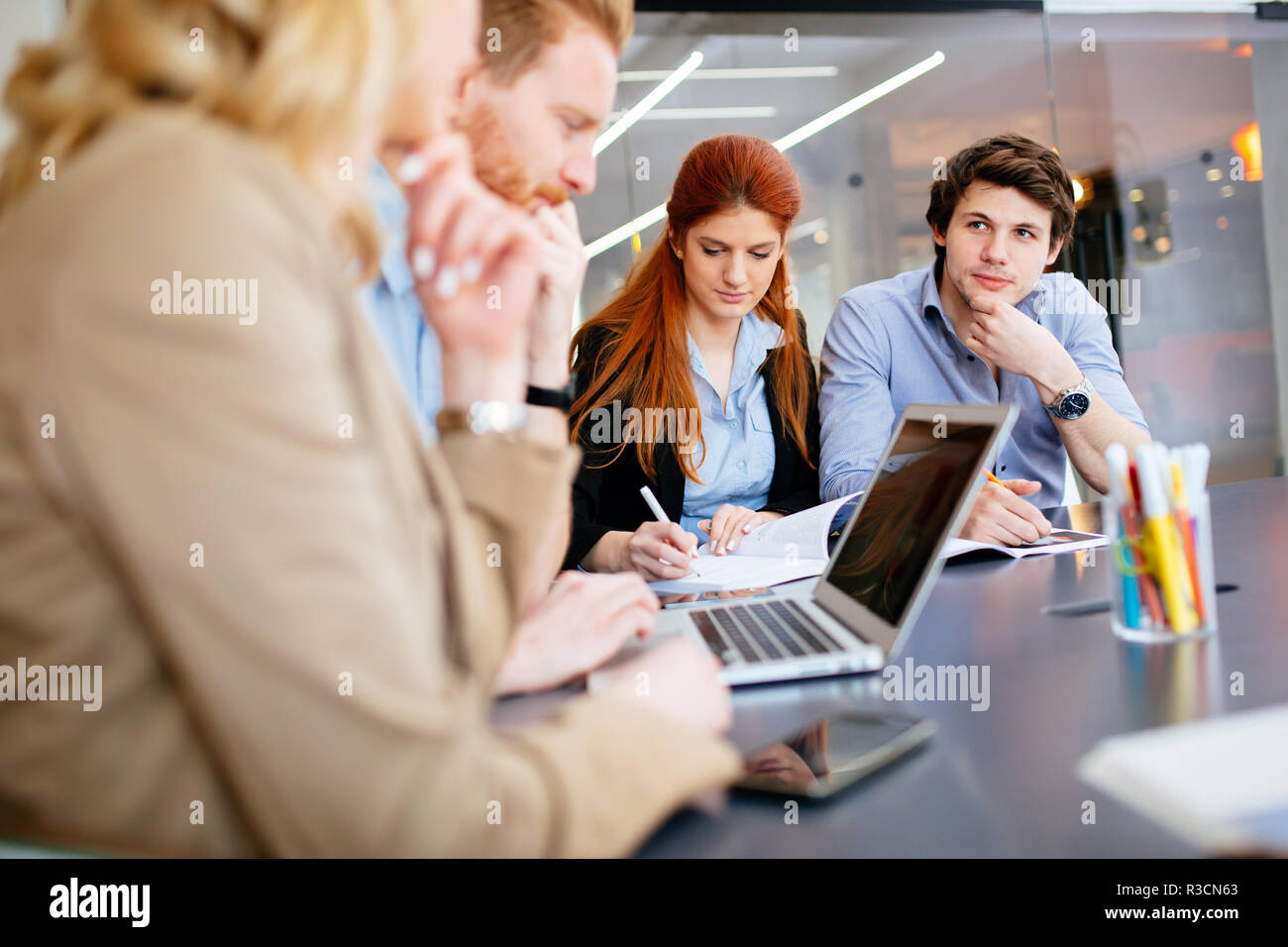 Business people collaborating in office Stock Photo - Alamy