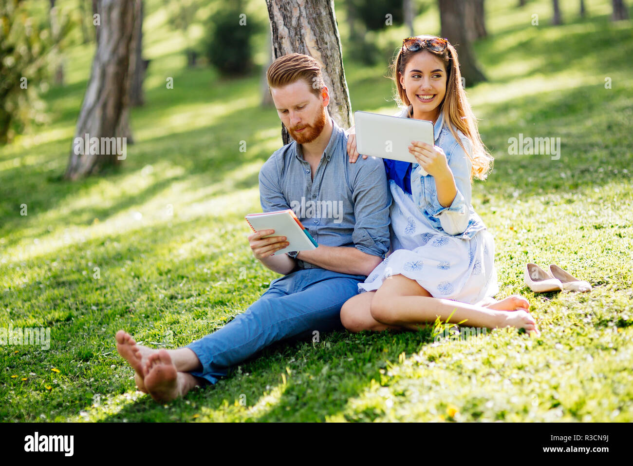 Cute university students studying Stock Photo - Alamy