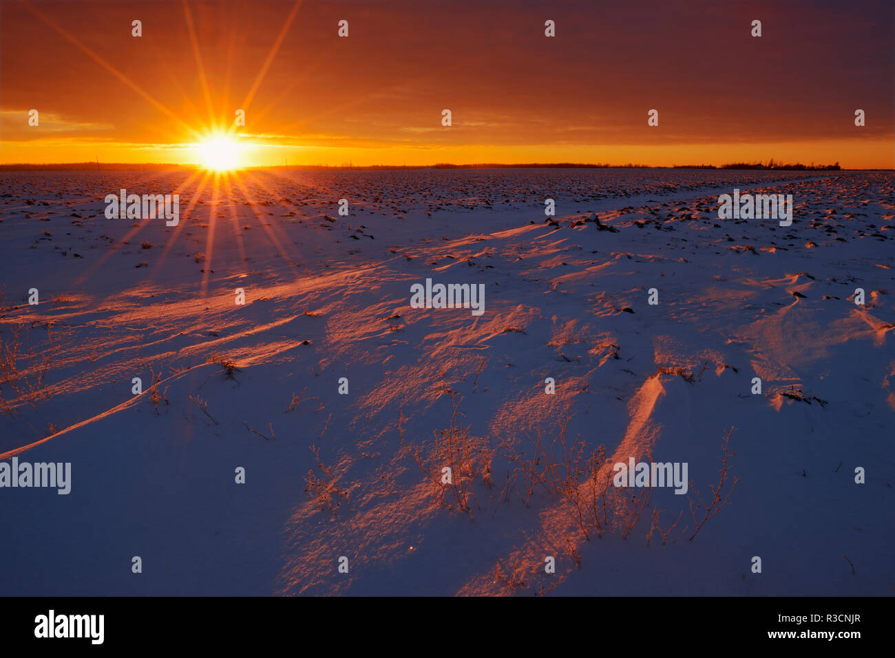 Sunrise over snow covered hi-res stock photography and images - Alamy
