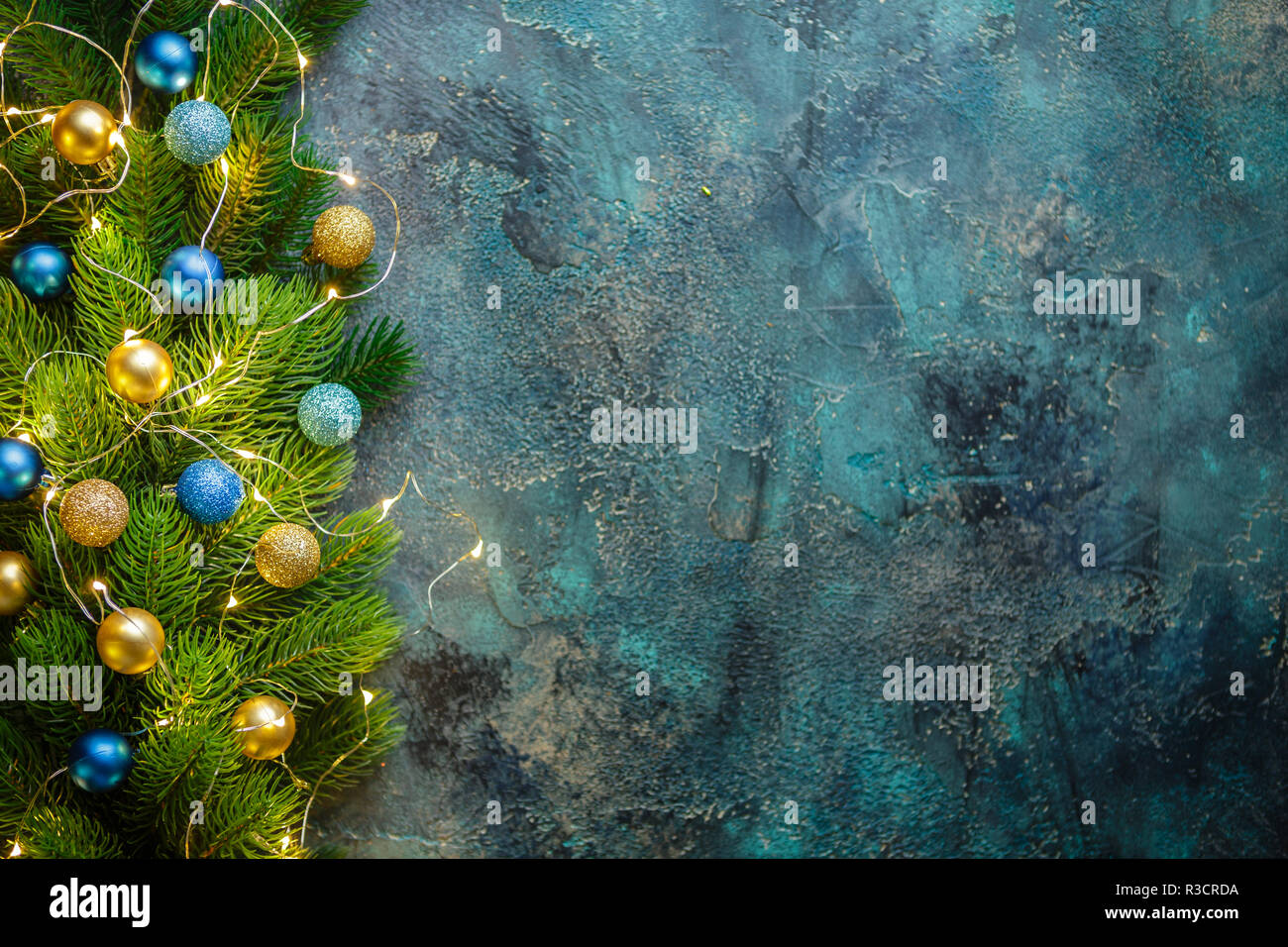 Christmas holiday frame with festive decorations blue and gold baubles ...