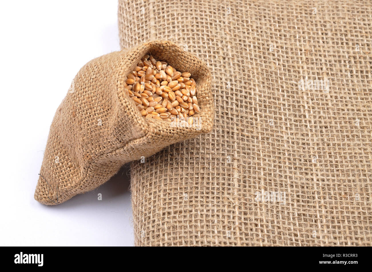 sack of grain on white Stock Photo - Alamy