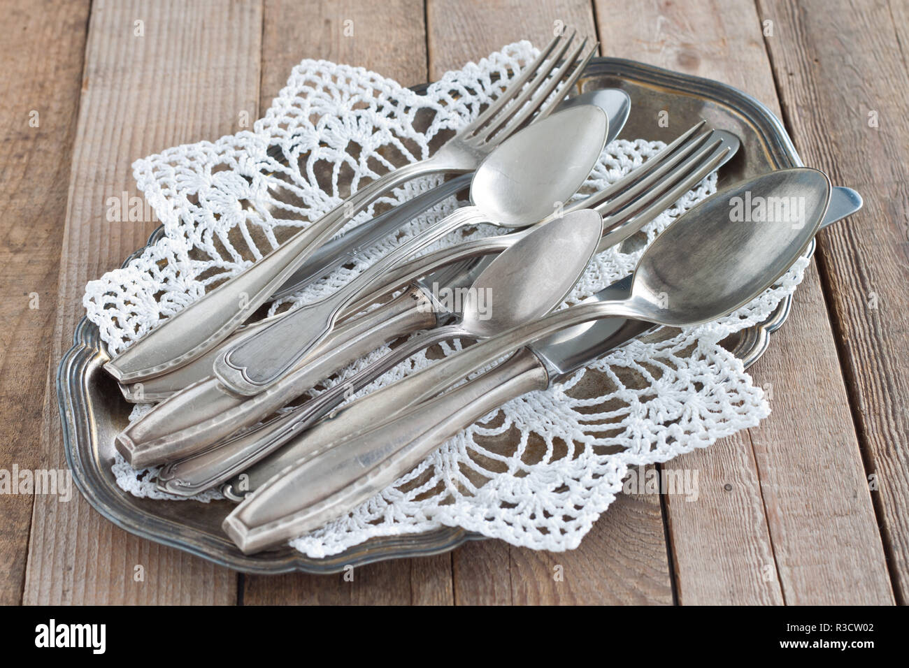silverware on silver platter Stock Photo - Alamy
