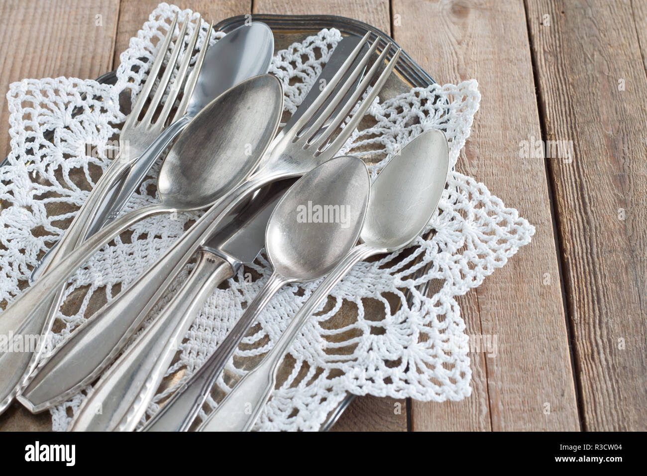 silverware on silver platter Stock Photo - Alamy