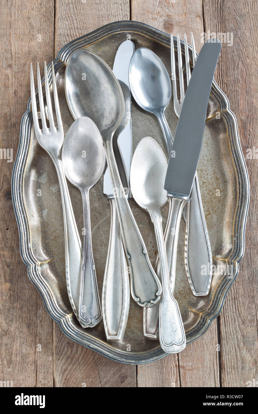 silverware on silver platter Stock Photo - Alamy