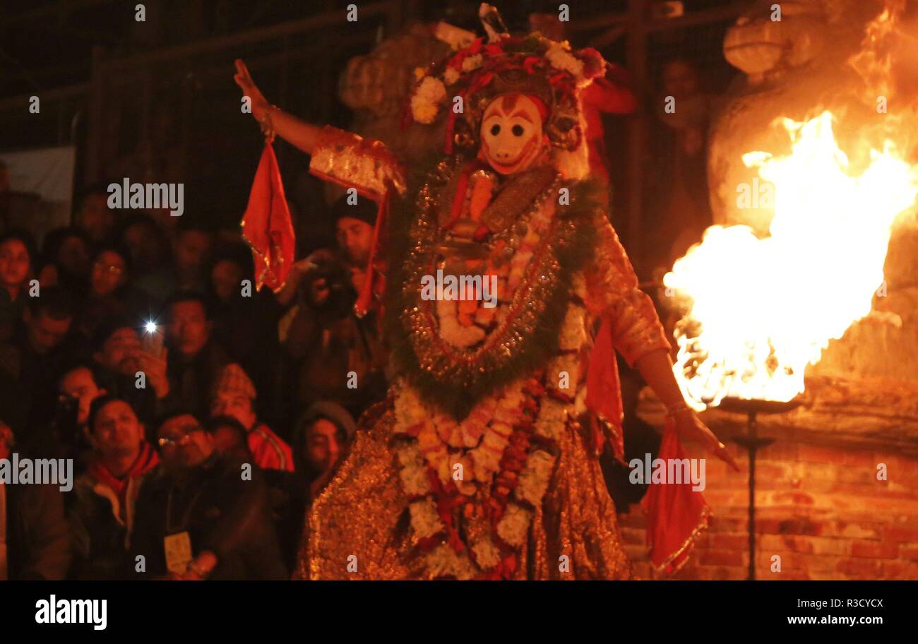 Lalitpur, Nepal. 22nd Nov, 2018. A man dressed up as Hindu god Narsing ...