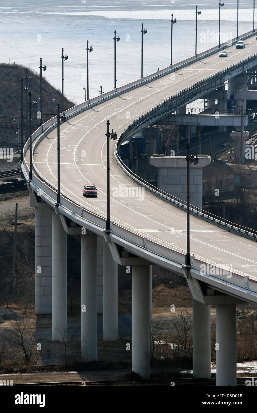 Old red car on a bridge Stock Photo - Alamy