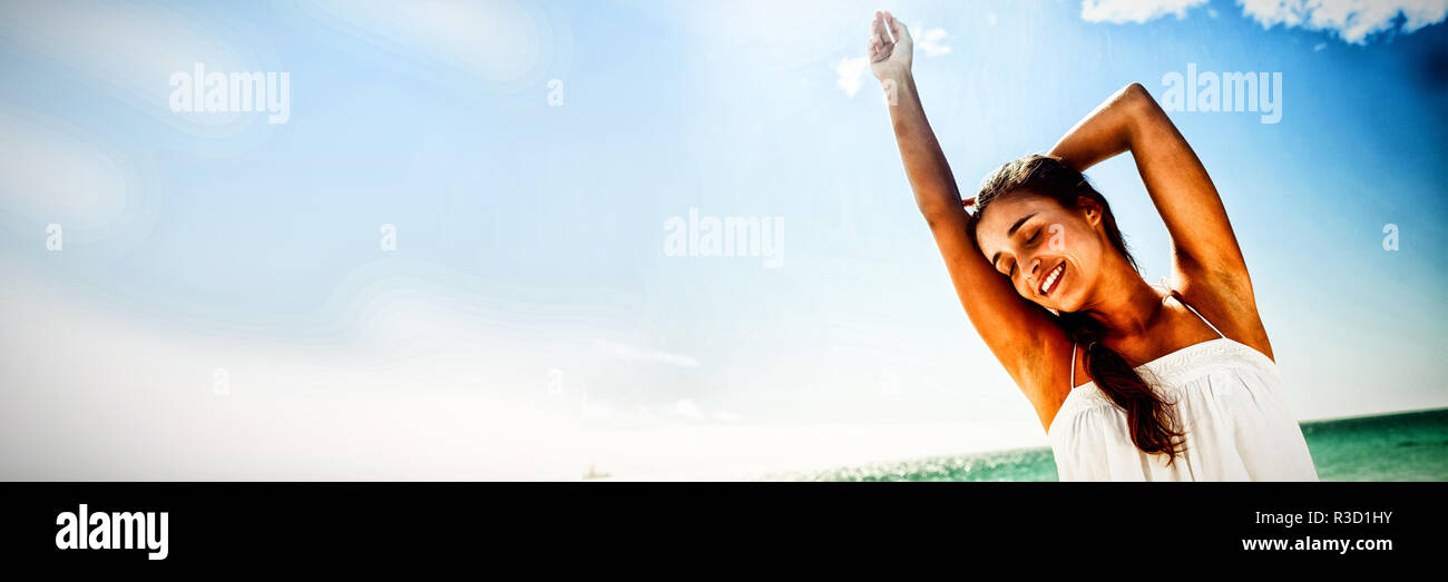 Portrait of smiling woman on the beach Stock Photo - Alamy