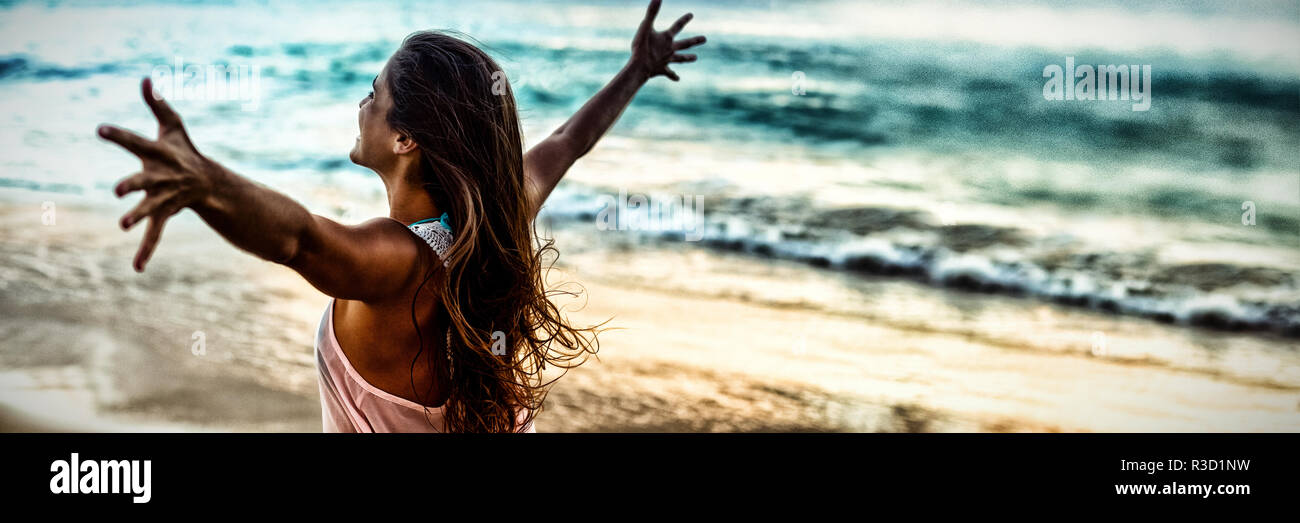 Female standing stretching arms out hi-res stock photography and images ...