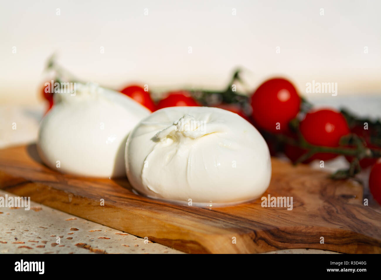 Fresh soft white burrata, buttery cheese, made from a mix of mozzarella ...