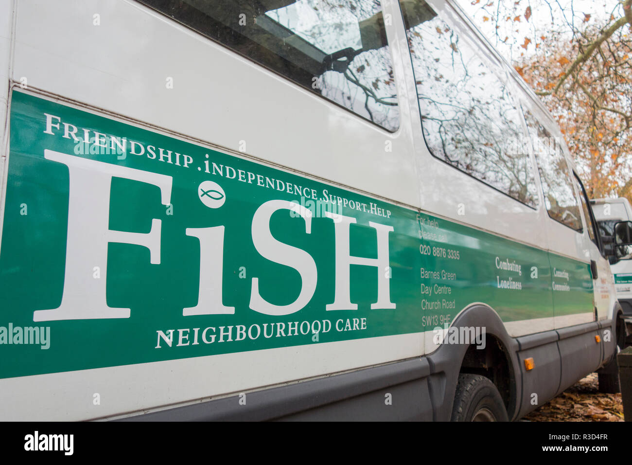 A Fish Neighbourhood care minibus parked outside the Barnes Green Day ...