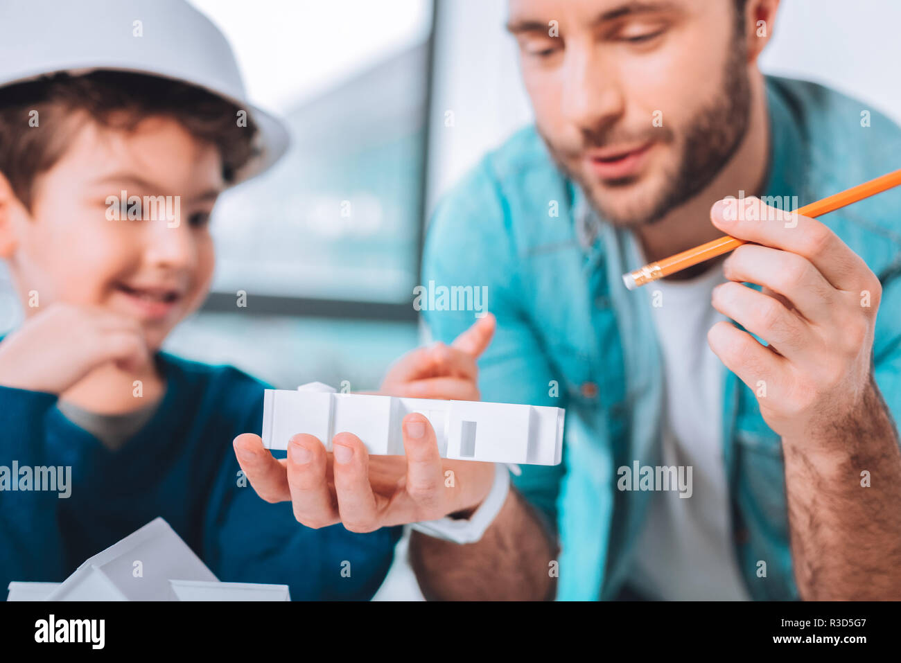 Correct way. Man correcting his sons mistakes while explaining Stock ...