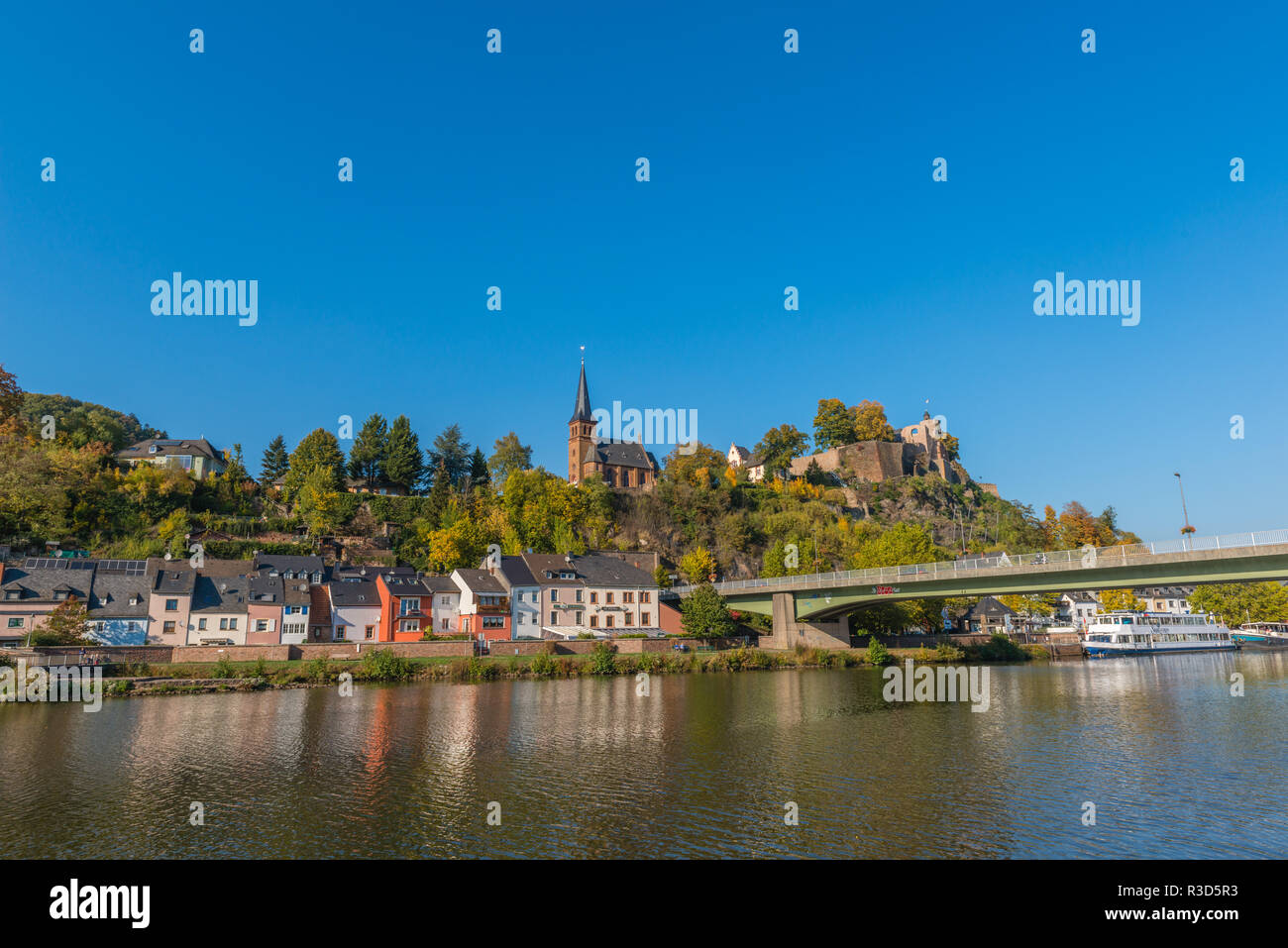 Ruin of Castle Saarburg, town of Saarburg on Saar River, pleasure boats touring the Saar, Nature ...
