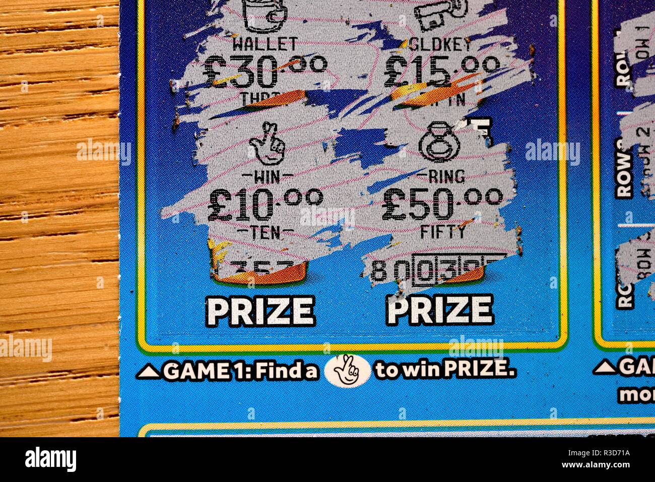 Winning lottery Scratchcard Stock Photo - Alamy