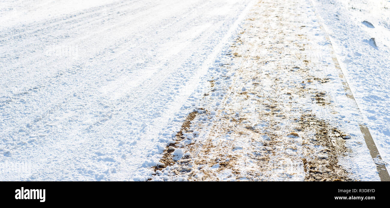 Footpath and road in winter, background with snow and sand Stock Photo ...