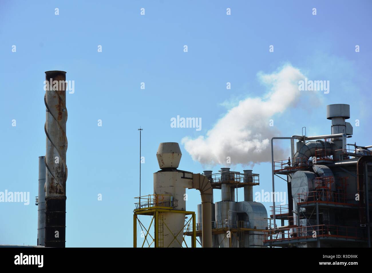 factory with smoke from chimneys Stock Photo - Alamy