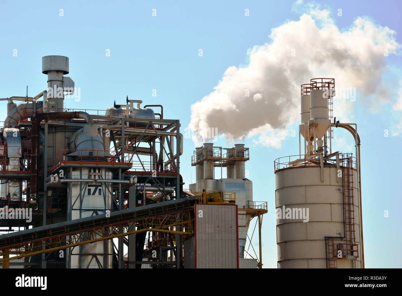 factory with smoke from chimneys Stock Photo - Alamy