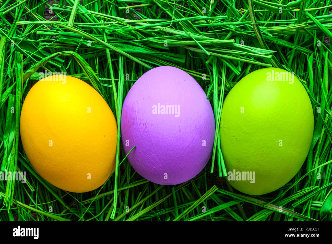 Spring easter eggs in nest with grass, eggs background Stock Photo - Alamy