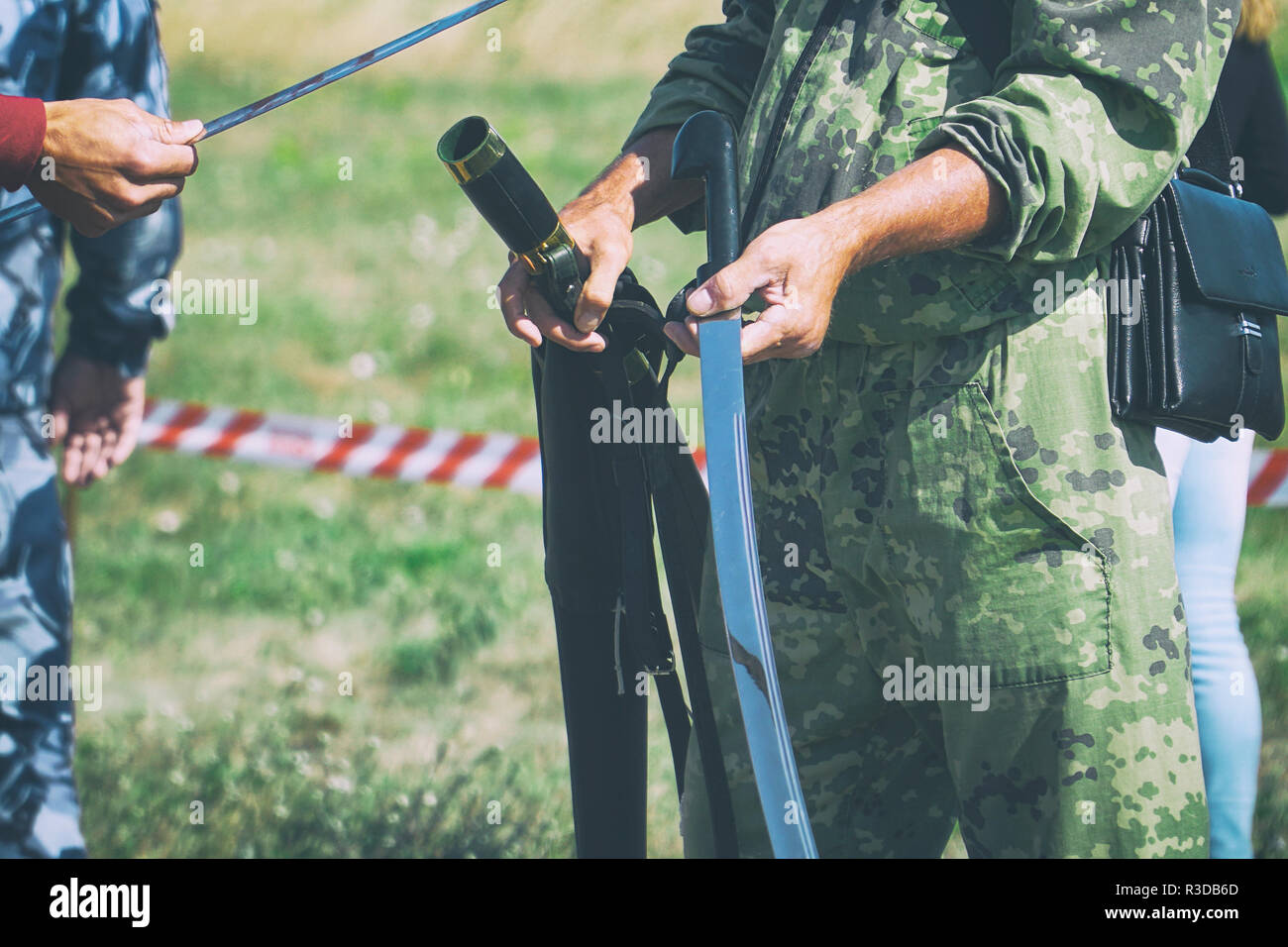 Cavalry sword in the hands of soldier Stock Photo - Alamy