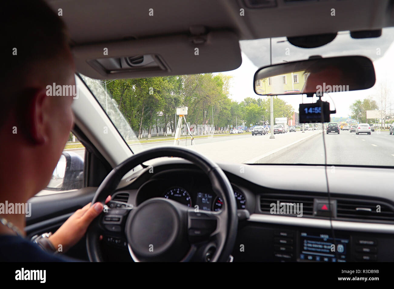 A man driving a car. View from the windshield Stock Photo - Alamy