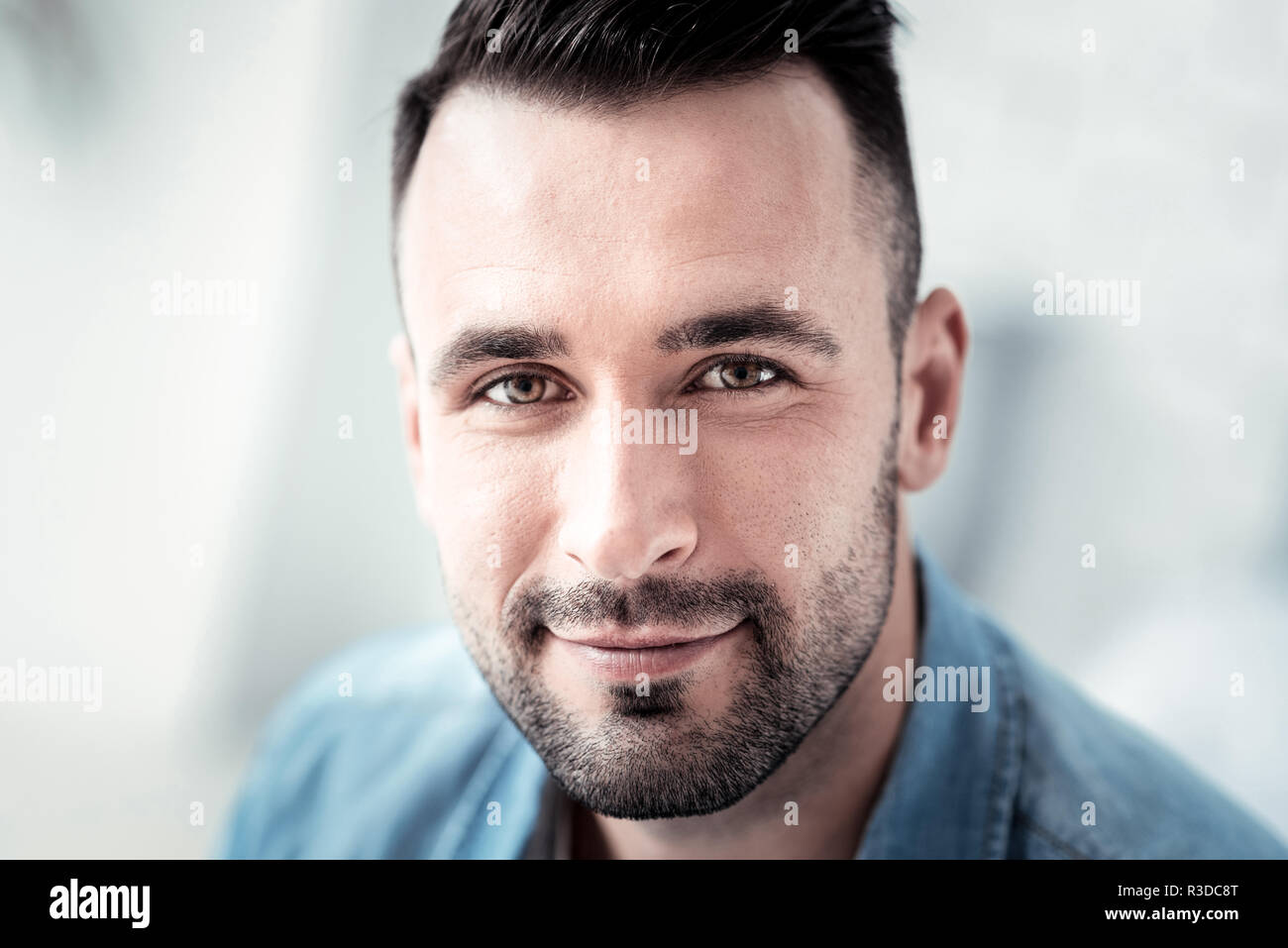 Great day. Positive delighted man demonstrating his emotions and ...