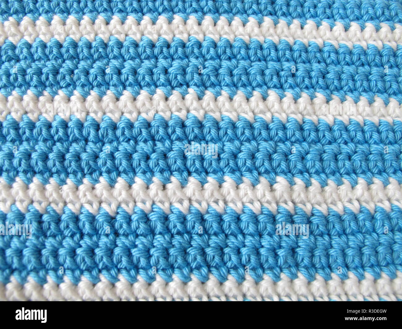 crochet background of crochet in white and blue Stock Photo - Alamy