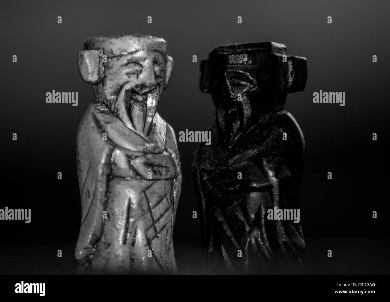 Two king chess pieces facing off Stock Photo - Alamy