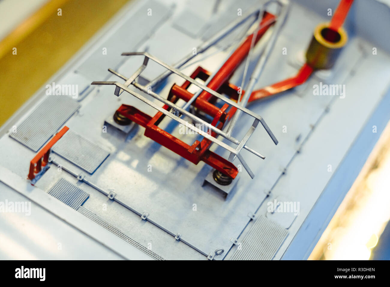 Miniature toy model of modern train crossing bridge Stock Photo - Alamy