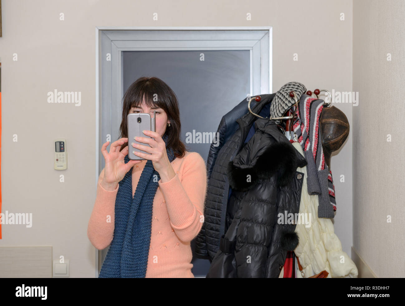 Woman in corner of room hi-res stock photography and images - Alamy