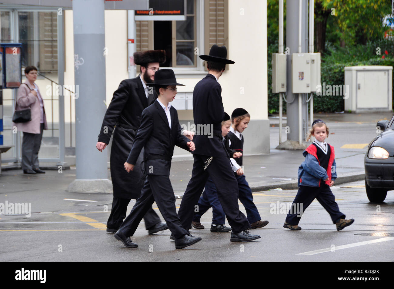 Switzerland: Orthodox jewish people walking across the street to the ...