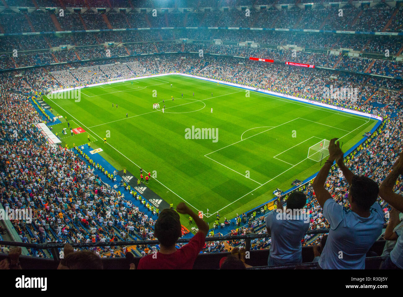Football match, people celebrating a goal. Santiago Bernabeu stadium ...