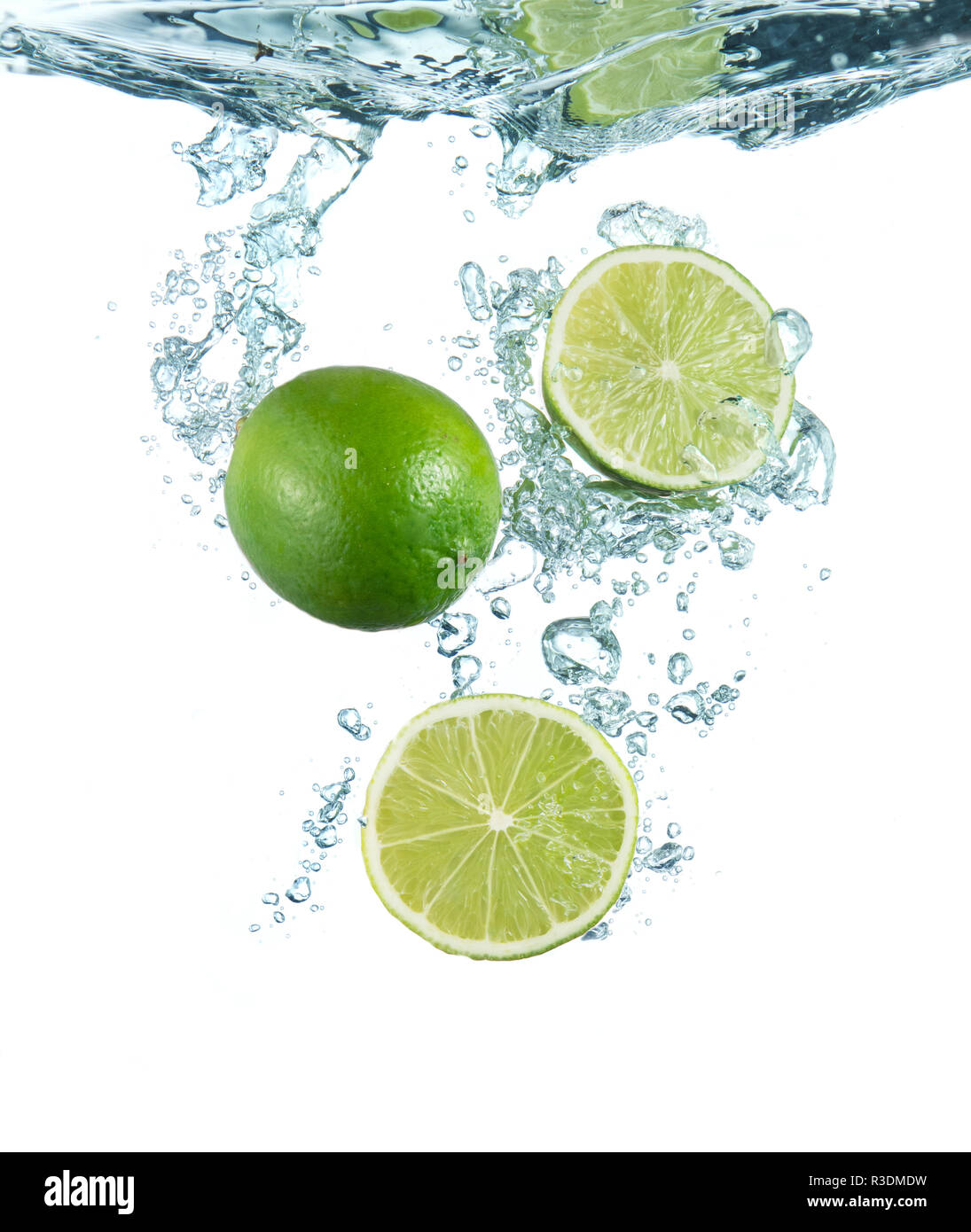 lime falling into water Stock Photo - Alamy