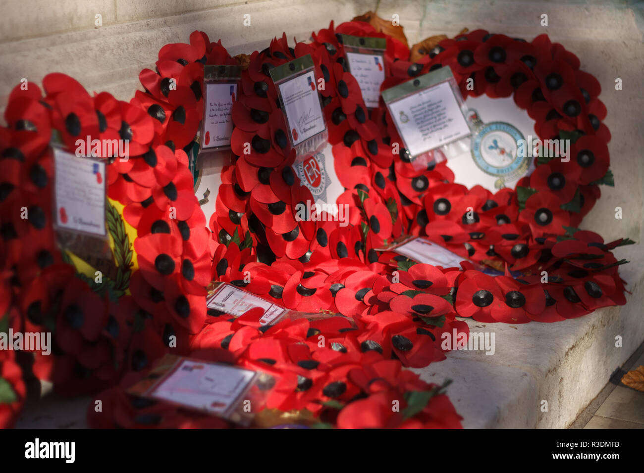 Remembrance Day poppies at the foot of the war memorial. The Promenade ...