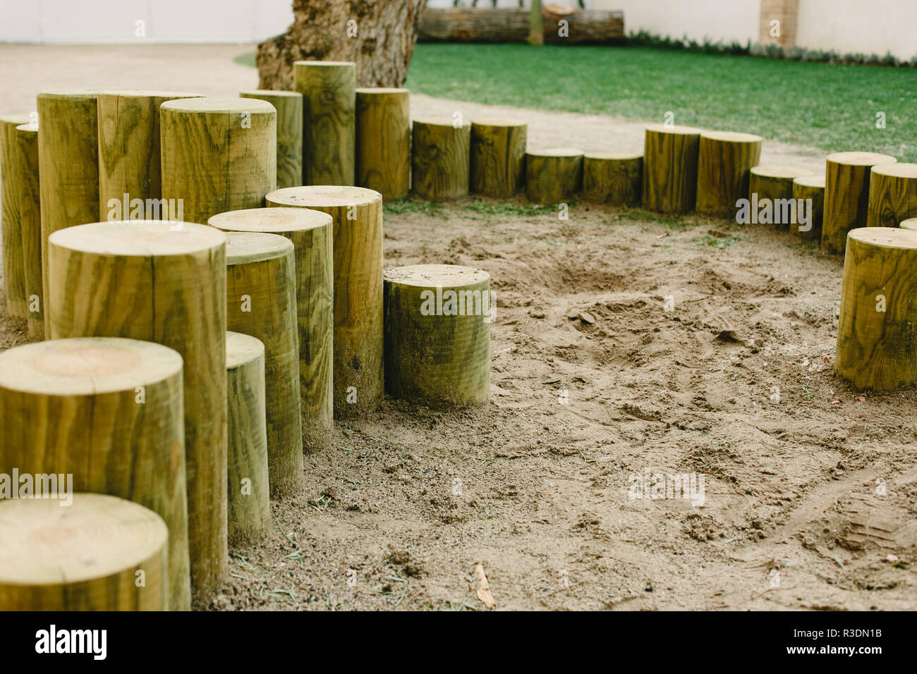 Logs and wooden sticks installed in a school for the children's game ...