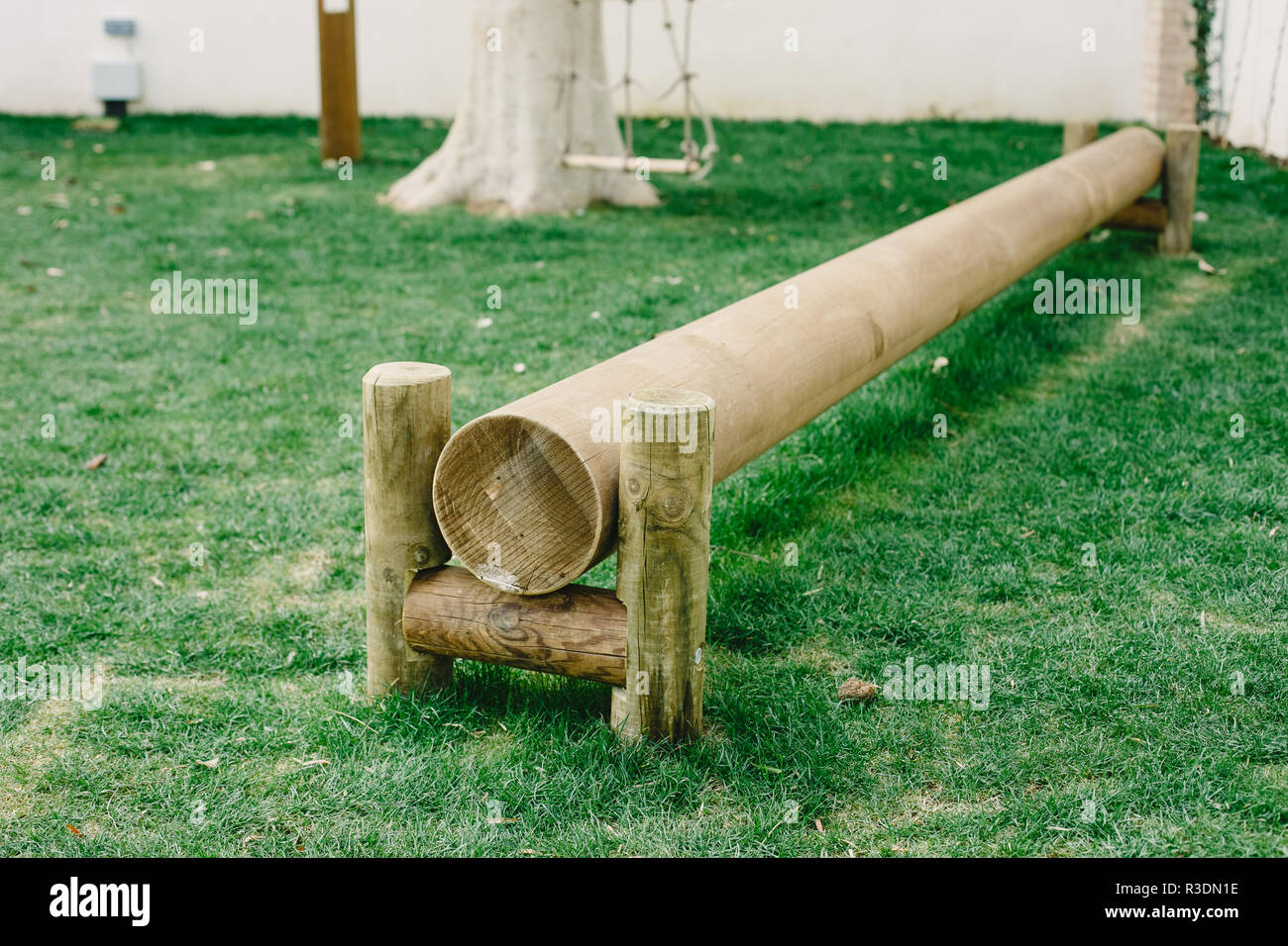 Logs and wooden sticks installed in a school for the children's game ...