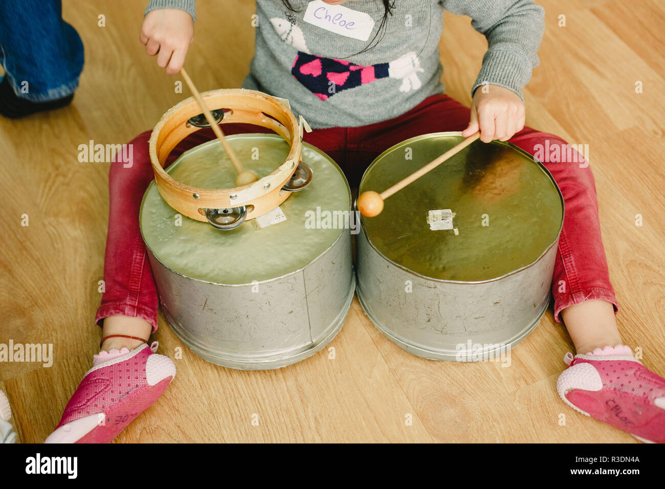 Music teacher and child and drums hi-res stock photography and images ...