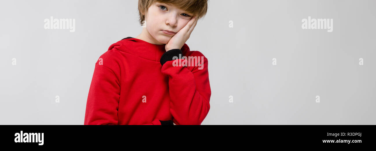 Sad teenage boy in fashionable clothes Stock Photo - Alamy