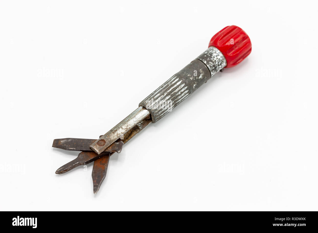 an old ratcheting screwdriver with three different blades Stock Photo ...
