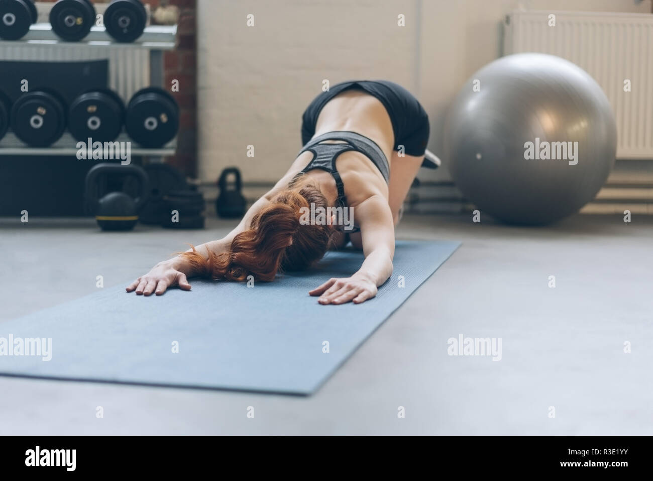 Woman and arms behind back exercise hi-res stock photography and images ...