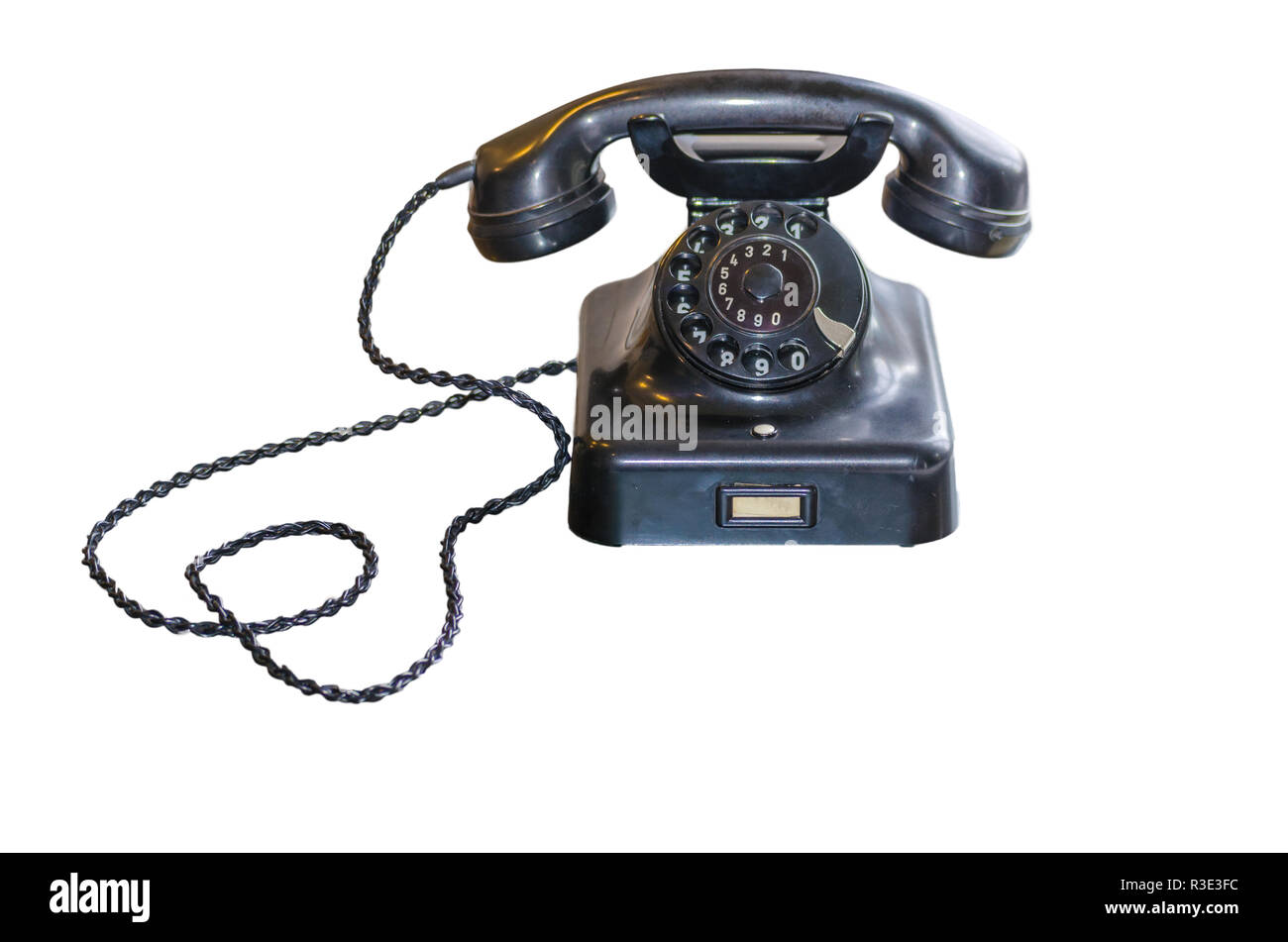 antique phone with dial disc on a white background Stock Photo - Alamy