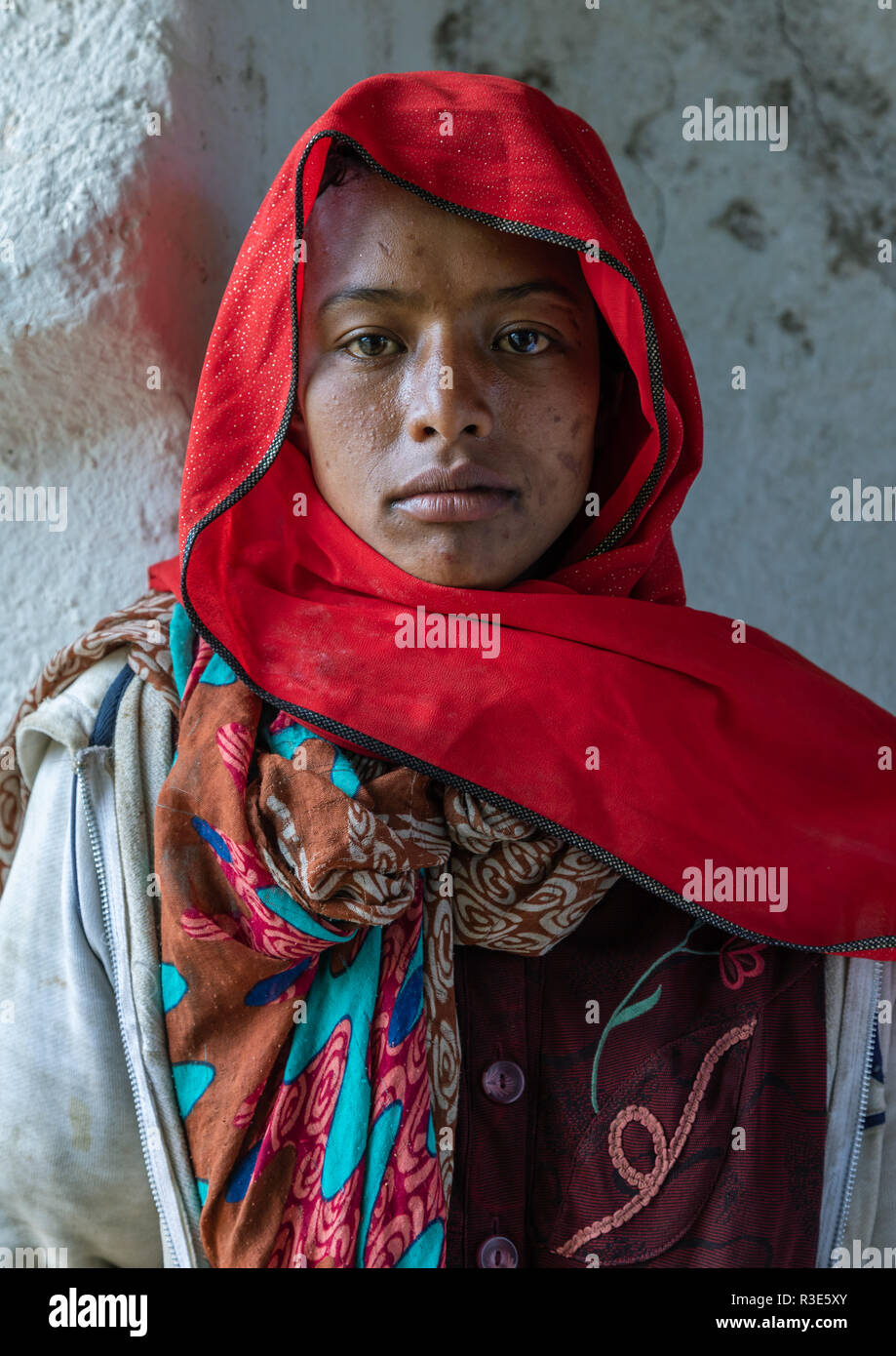 Veiled harari young woman in red, Harari Region, Harar, Ethiopia Stock ...
