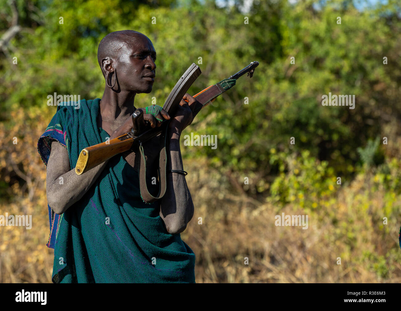 Suri tribe warrior with a kalashnikov, Omo valley, Kibish, Ethiopia ...