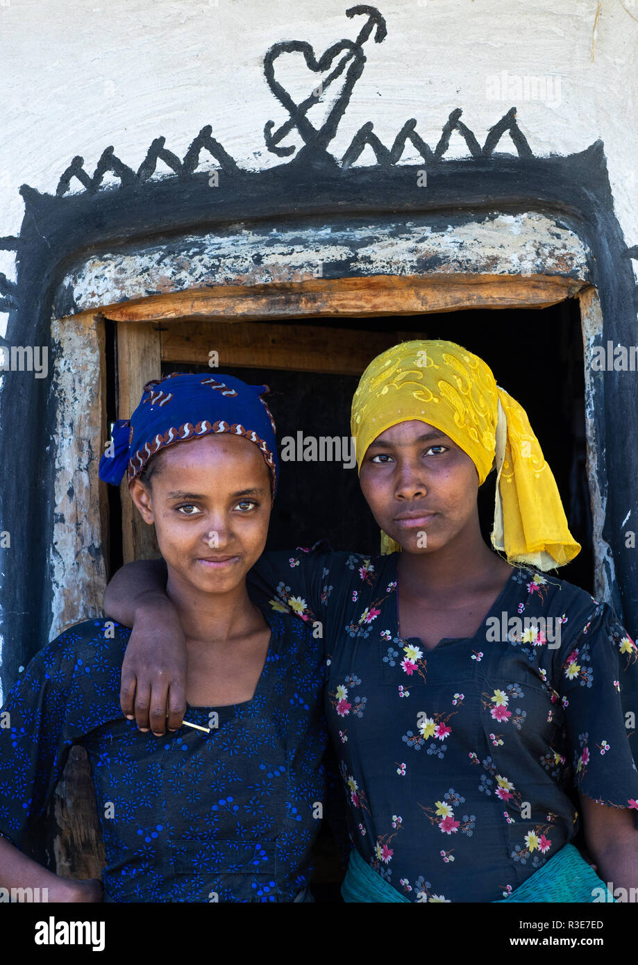Raya tribe gilrs at the entrance of a decorated hut, Afar Region ...