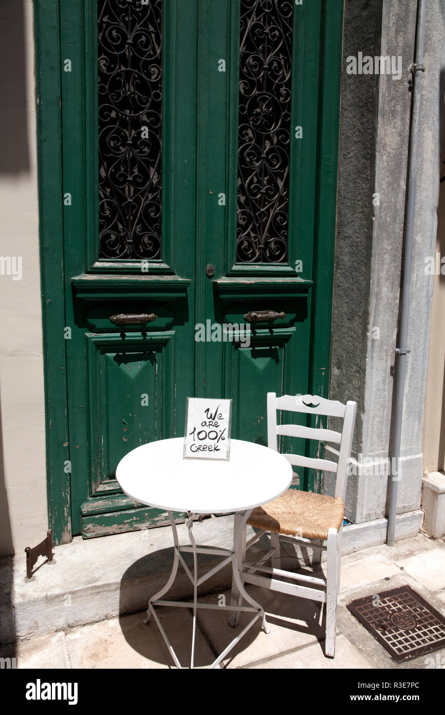 table chair and door plaka athens greece Stock Photo - Alamy