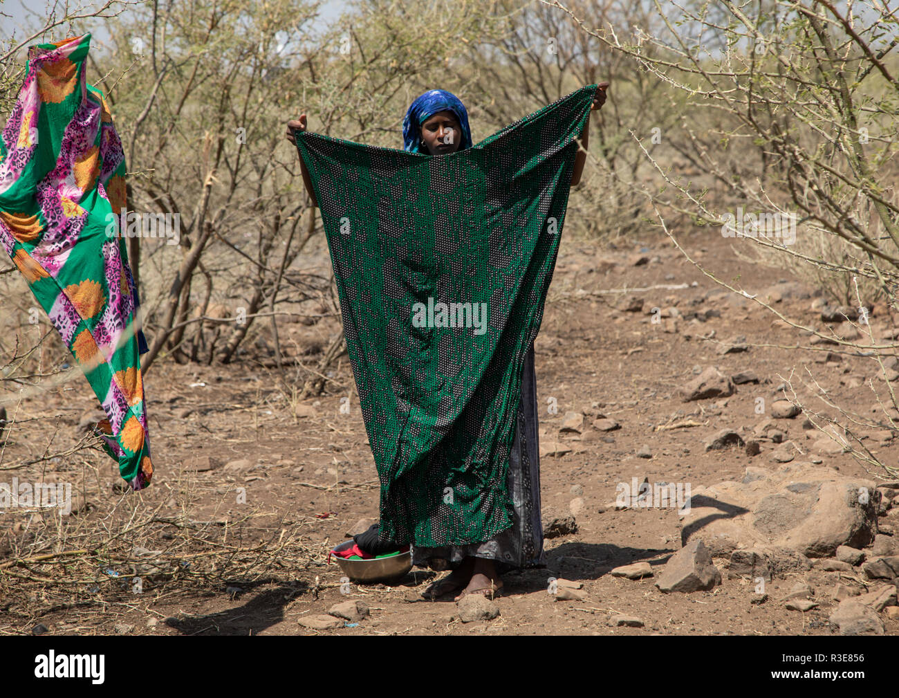 Woman drying clothes in hi-res stock photography and images - Alamy