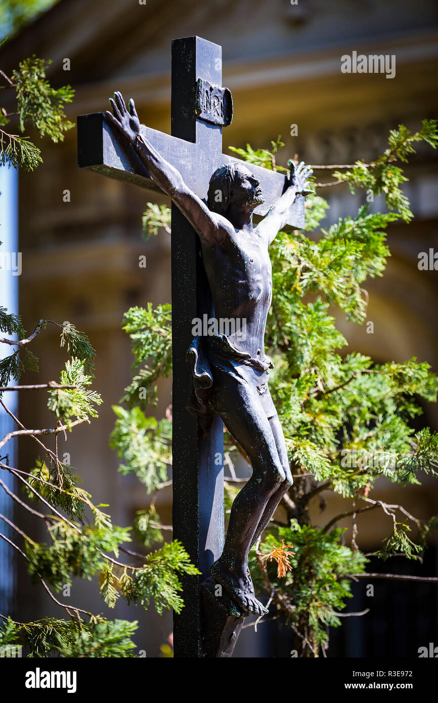MILAN, ITALY - JUNE 6, 2018 : Statues of mourning at the graves of the ...