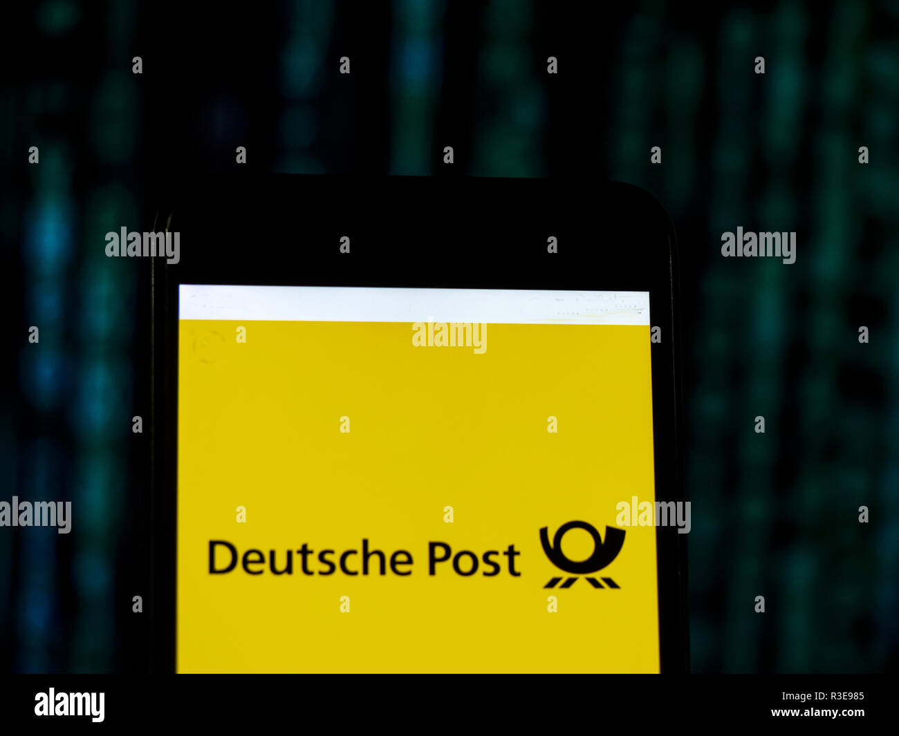 Deutsche Post Postal service company logo seen displayed on smart phone ...